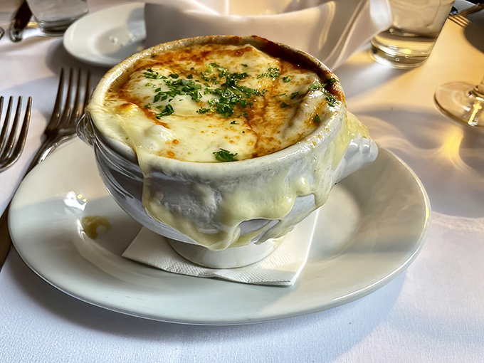 French onion soup that's wearing a cheese toupee so magnificent it deserves its own stylist and agent.