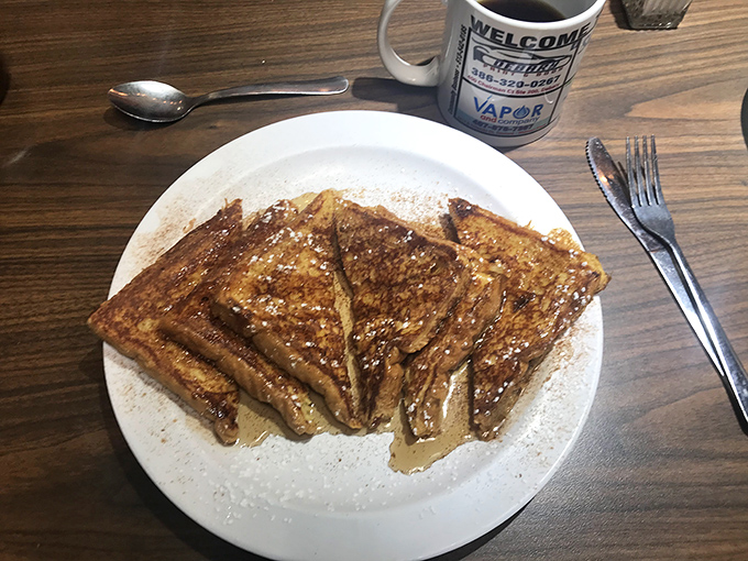 French toast that deserves its own Instagram account&mdash;golden-brown perfection dusted with powdered sugar and cinnamon. Breakfast's answer to the perfect sunset.