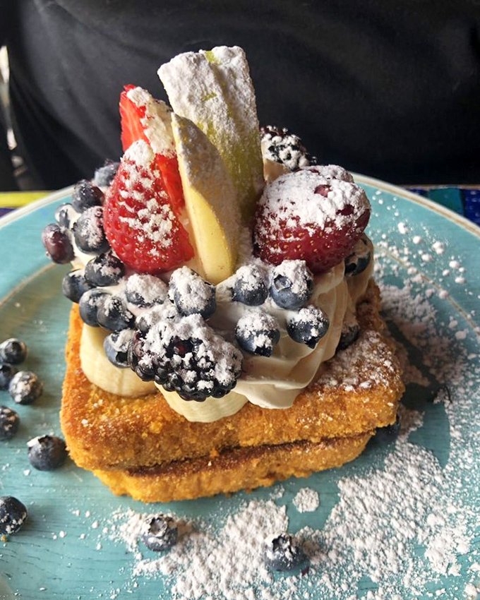 Captain Crunch French Toast with a berry crown fit for breakfast royalty. Diet plans crumble at the mere sight of this masterpiece.