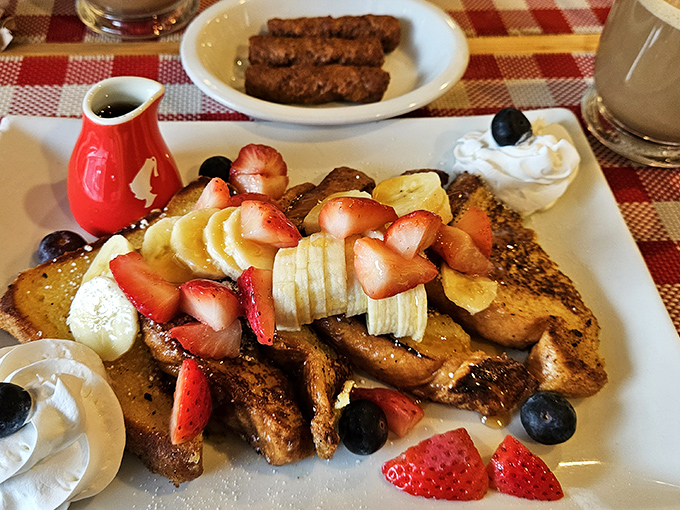 Behold the French toast that launched a thousand return visits! Brioche perfection topped with fresh fruit that makes nutritionists and hedonists equally happy.