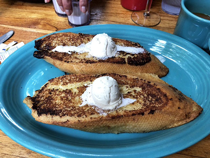 Tower's legendary French toast &ndash; custard-soaked sourdough that's achieved cult status for good reason. One bite and you'll join the congregation of the perpetually brunching.