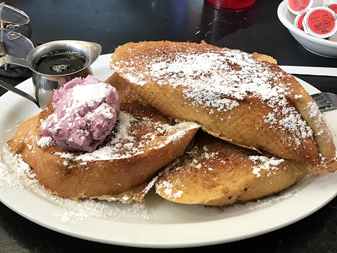 French toast that makes you question every other breakfast you've ever had. That berry butter is the supporting actor that steals the show.
