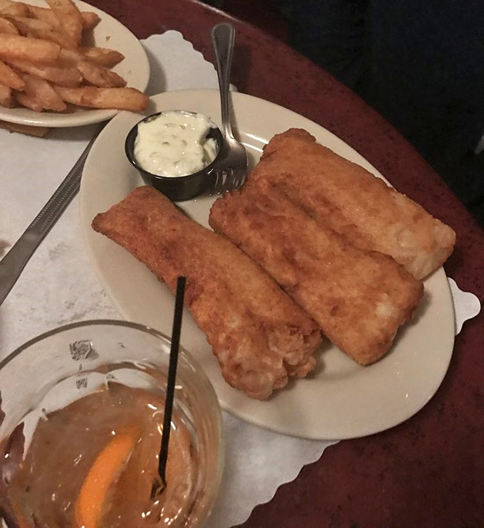 Golden-battered fish that shatters with each bite, paired with an old fashioned—the Wisconsin equivalent of champagne and caviar.