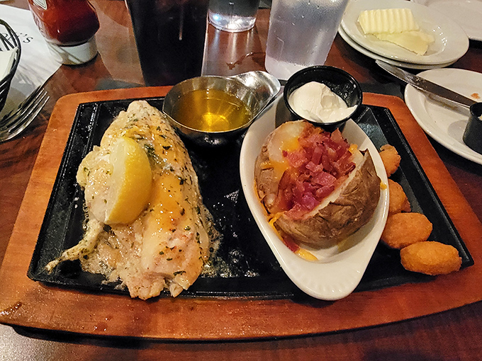 Seafood that makes landlocked Wisconsin feel like oceanfront property. That loaded baked potato could start a support group for "sides that steal the show."