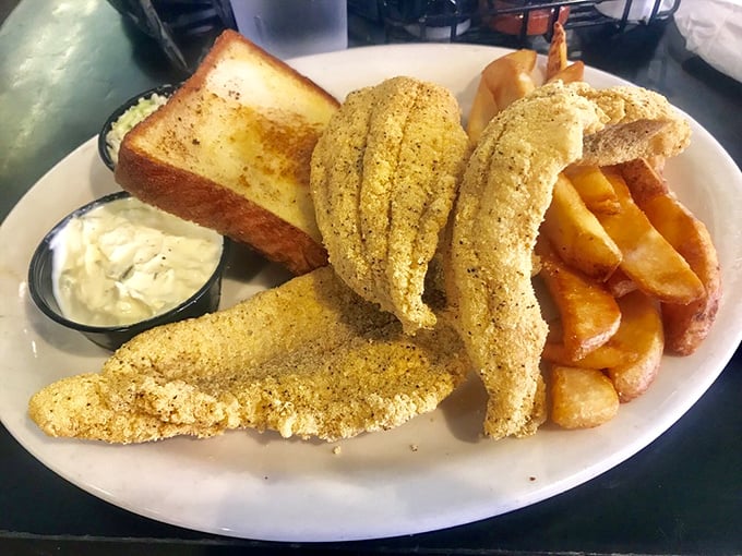 Golden cornmeal-crusted catfish that shatters with each bite, revealing pearly flesh that practically sings the blues.