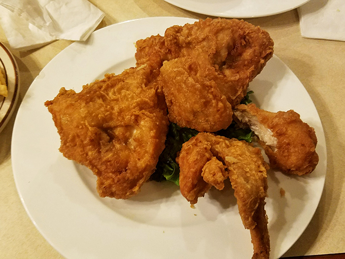 Golden-brown perfection that makes Colonel Sanders look like an amateur. This fried chicken doesn't just talk the talk—it clucks the cluck.