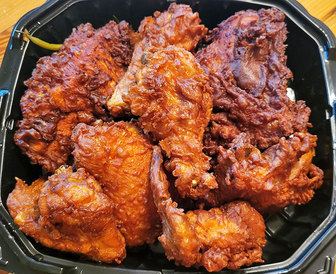 Golden-brown pieces of chicken sporting crackly coats that shatter like glass while protecting the juiciest meat imaginable. Poetry on a plate.