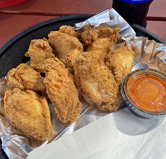 Golden-brown perfection that makes other fried chicken look like it's not even trying. That crunch should have its own soundtrack.