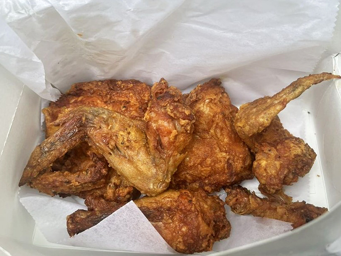 Golden-brown perfection in a box. This isn't just fried chicken&mdash;it's an edible masterpiece with a crunch you can hear across the room.