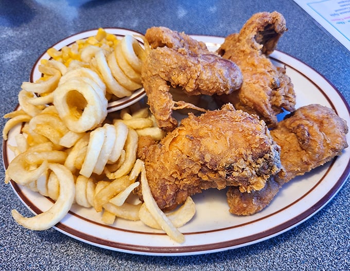 Golden-fried chicken that makes a sound so satisfying when you bite into it, nearby diners will experience serious food envy. Those onion rings aren't just sides&mdash;they're halos.