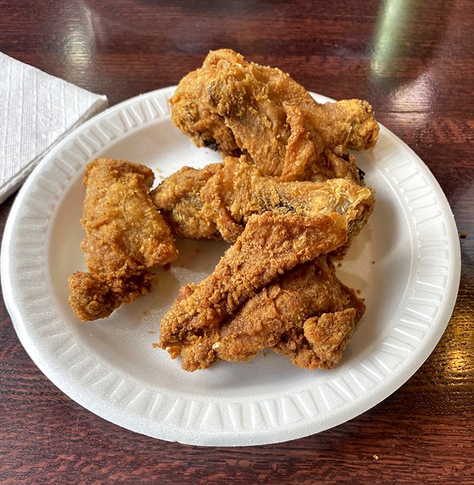 Golden-brown perfection that makes you understand why people drive hours for what appears to be "just chicken." Spoiler alert: it's never just chicken.