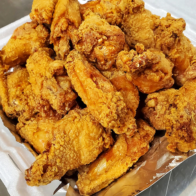 Golden perfection achieved: chicken so crispy it practically applauds itself when you take a bite.