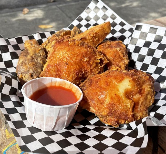 Golden-brown perfection that makes you want to write love sonnets to fried chicken. That crunch should have its own soundtrack.