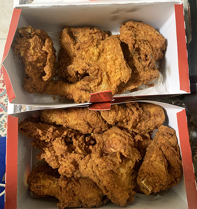 Behold the holy grail of fried chicken—a golden-brown masterpiece that makes you want to write poetry about poultry.