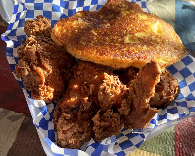 Golden-brown fried chicken alongside cornbread that could make a Southern grandma nod in approval. Perfection doesn't need fancy plating.