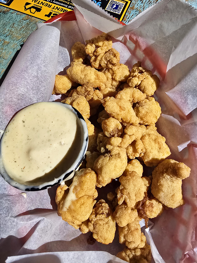 Golden nuggets of fried gator tail that could convert even the most skeptical eater. The South's ultimate culinary dare that pays off deliciously.