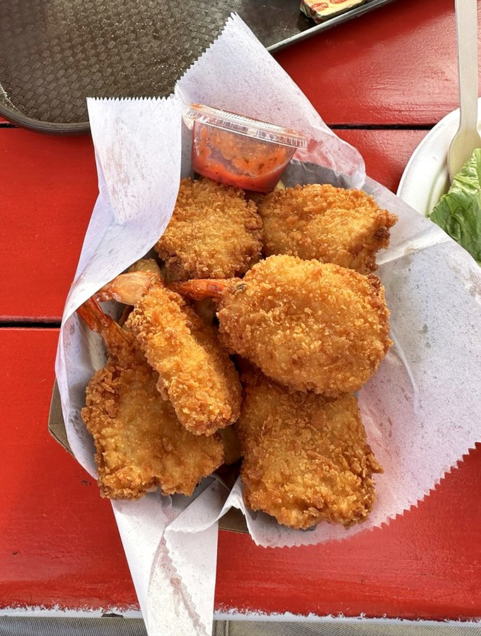 Golden-fried perfection that shatters with each bite. These crispy crustaceans are what happens when the ocean meets culinary magic.