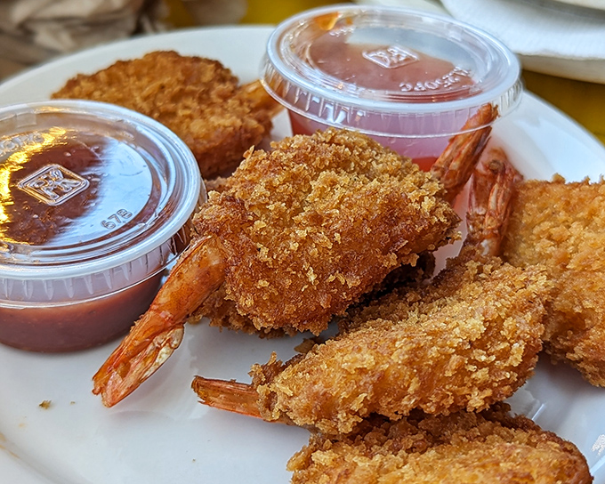 Golden-fried shrimp that crunch like nature's perfect potato chip, but inside? Pure oceanic sweetness that makes you close your eyes in bliss.