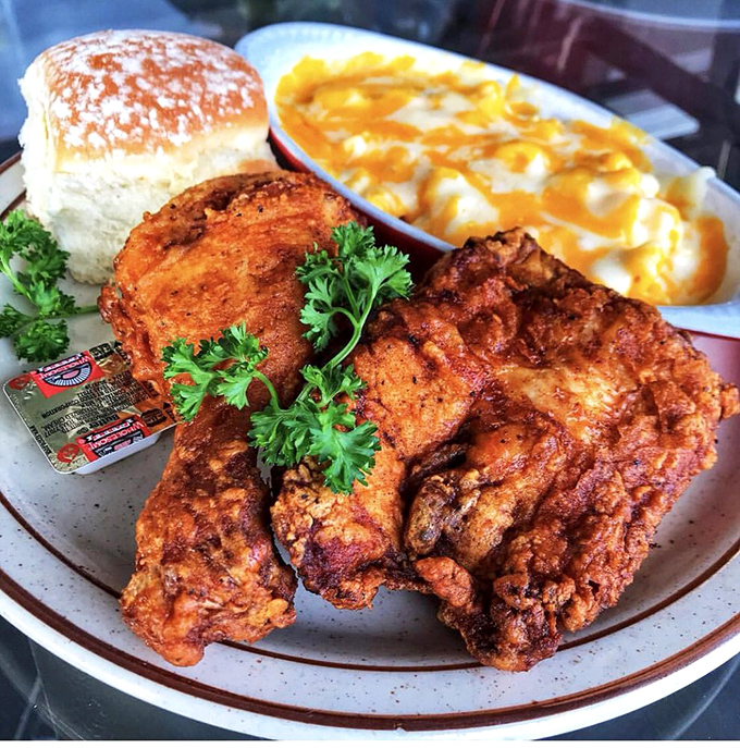 Golden-brown perfection that makes you understand why people have chicken-based dreams. That mac and cheese isn't playing second fiddle to anyone.