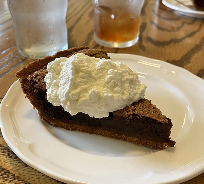 The legendary fudge pie with whipped cream—where chocolate transcends to something spiritual. Worth every mile of the journey.