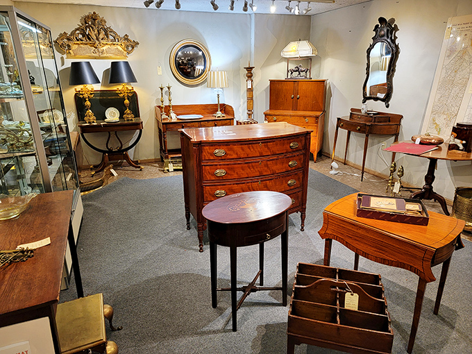 This isn't just furniture&mdash;it's a family reunion of fine wood relatives. The chest of drawers holds court while mirrors reflect centuries of craftsmanship.