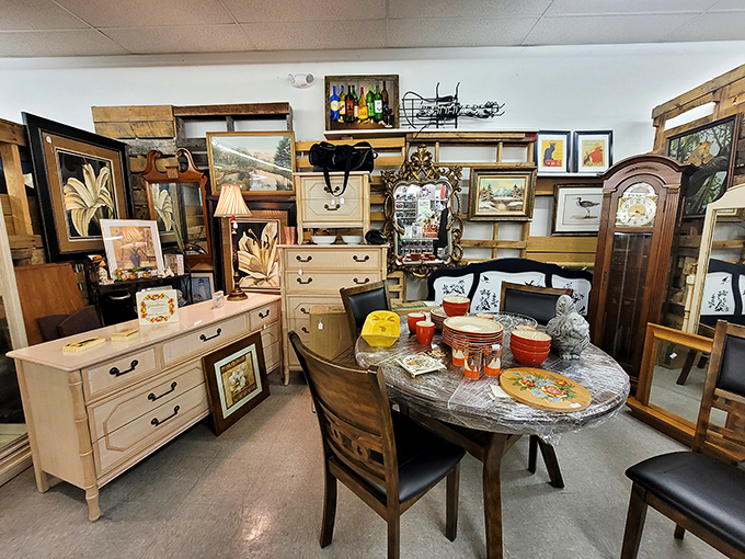 Someone's dining room from 1965 is waiting for its second act. That cream dresser has stories to tell, and those framed prints are ready for their comeback tour.