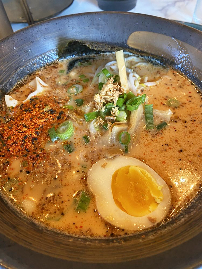 This bowl arrives looking like autumn in Japan decided to take a swim in liquid gold.