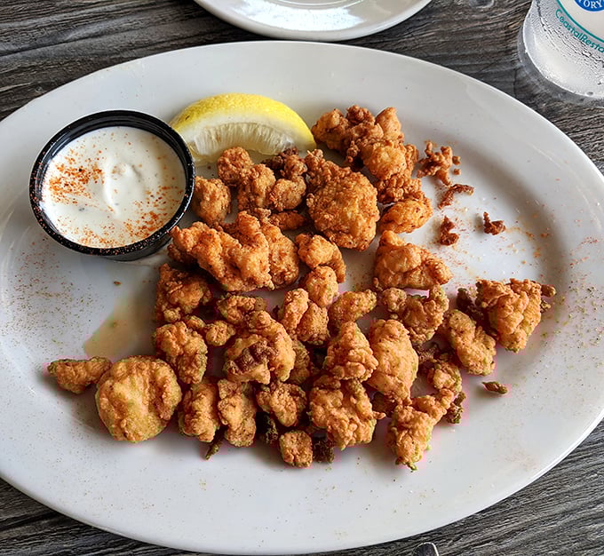 Golden-fried nuggets of happiness served with a side of zesty sauce&mdash;proof that sometimes the best things come in small, crunchy packages.