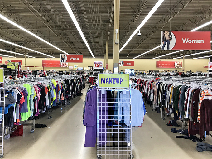 Racks stretch toward infinity like a textile universe, color-coded for those who take their bargain hunting seriously.