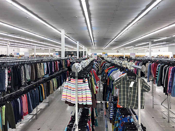 Clothing racks stretch toward infinity like an optical illusion. Somewhere in this fabric forest is the perfect jacket you didn't know you needed.