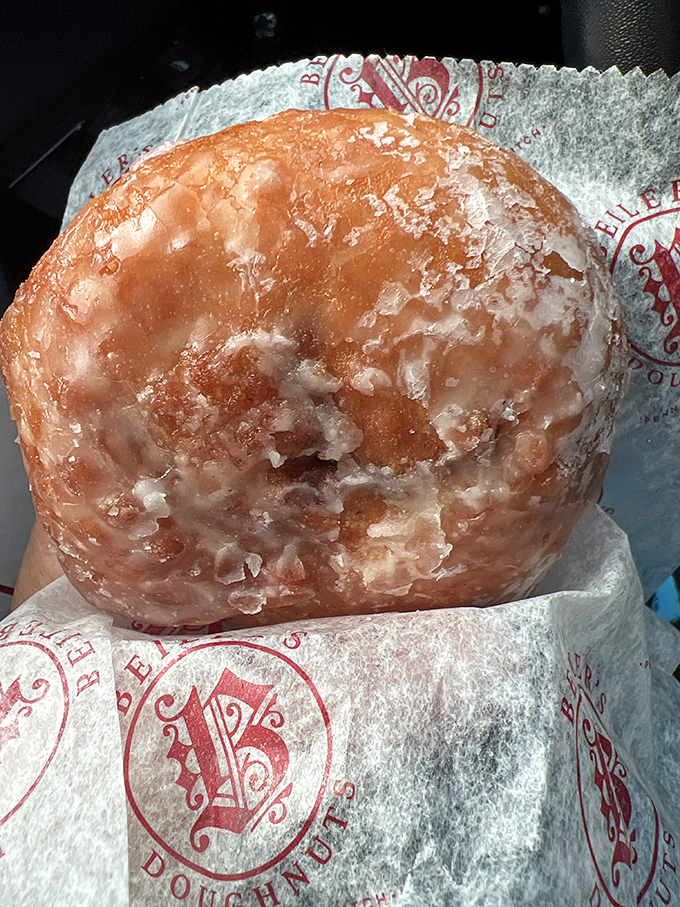 Behold, the glazed masterpiece in its natural habitat. That sheen isn't just glaze&mdash;it's a window into donut nirvana.