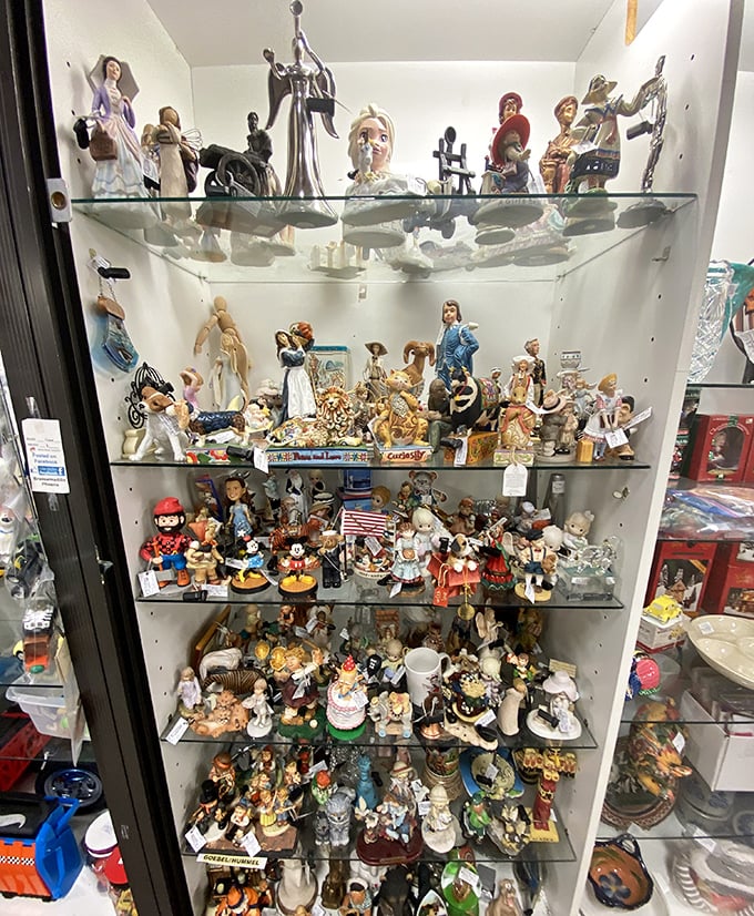 Tiny porcelain people with big personalities. This figurine army stands ready to judge your decorating choices from their glass-shelf kingdom.