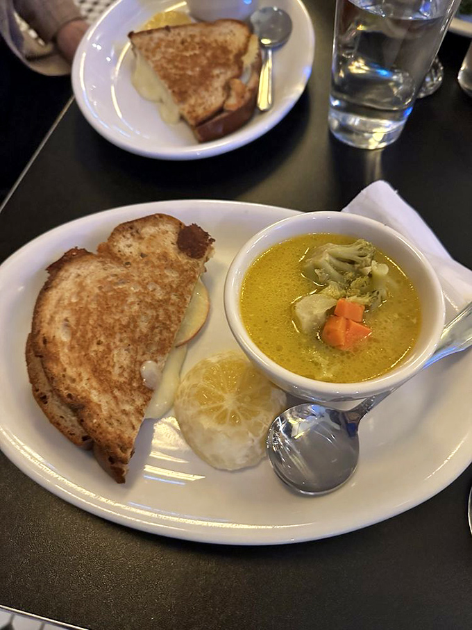 Behold the humble grilled cheese, elevated to art form. That golden exterior gives way to a cheese pull worthy of Olympic medals.