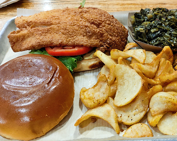 The legendary grouper sandwich in all its glory &ndash; a masterpiece of crispy, flaky perfection that makes other fish sandwiches weep with inadequacy.