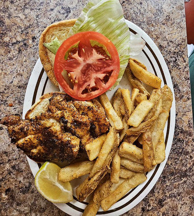 Behold the golden-crusted grouper sandwich that transforms skeptics into believers with every magnificent bite.