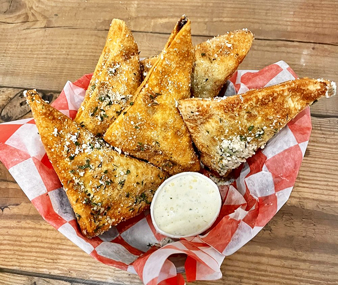 Golden-fried triangles of joy that make regular guacamole seem like it needs to try harder. The dipping sauce is just showing off at this point.
