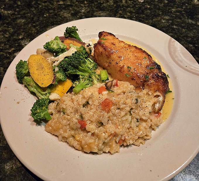 Behold the legendary halibut that draws pilgrims from across the Midwest, perfectly golden and absolutely worth the journey here.