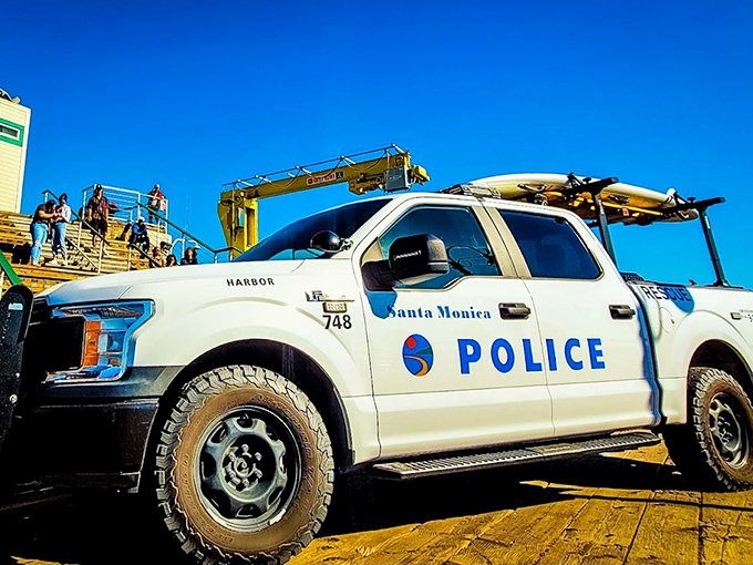 Safety with a view! The Harbor Rescue team stands ready on their wooden runway, proving paradise comes with its own guardian angels.