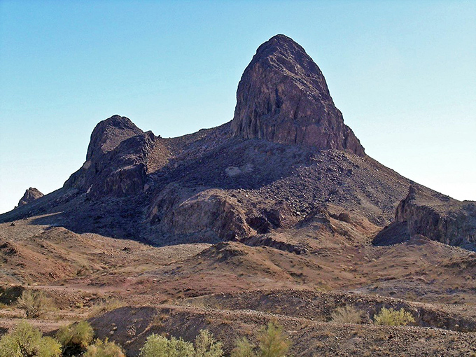 This isn't just any mountain &ndash; it's a desert cathedral rising from the earth. Sculptural perfection that's been working on its dramatic pose for millions of years.