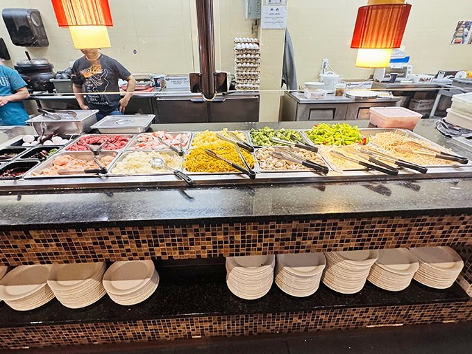 Fresh ingredients await their transformation at the hibachi station, where patience rewards you with a sizzling, customized creation worth every minute of anticipation.