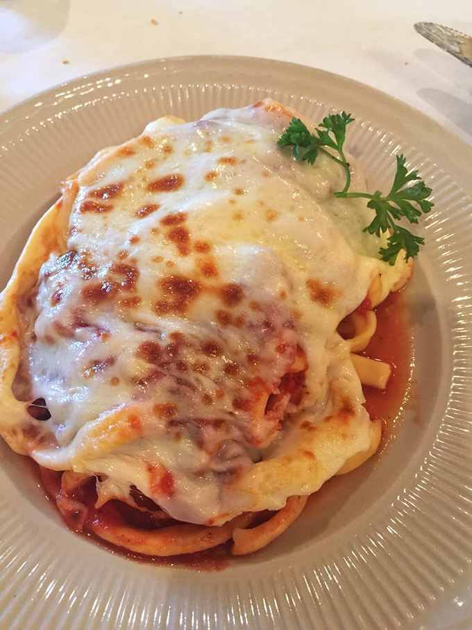 Behold the star of the show &ndash; layers of pasta, cheese, and sauce creating an edible masterpiece that would make Michelangelo weep with joy.