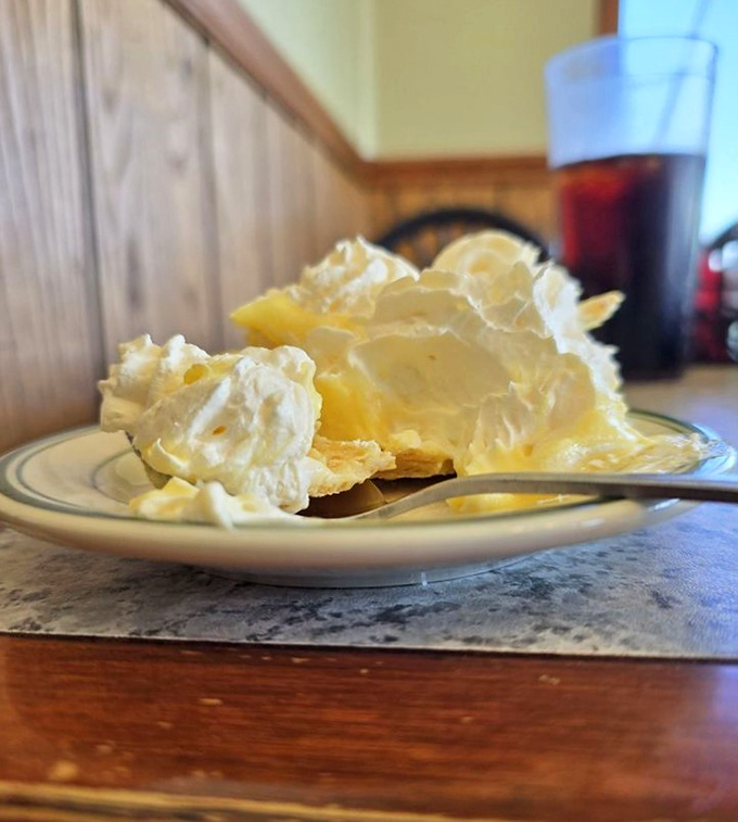 Cream pie so light it might float away if not anchored by that perfect crust. The kind of dessert that makes you consider skipping the main course entirely.