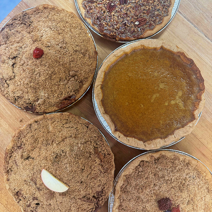 Pie perfection in its natural habitat. These handcrafted beauties with their rustic crusts and seasonal fillings make store-bought versions hang their heads in shame.
