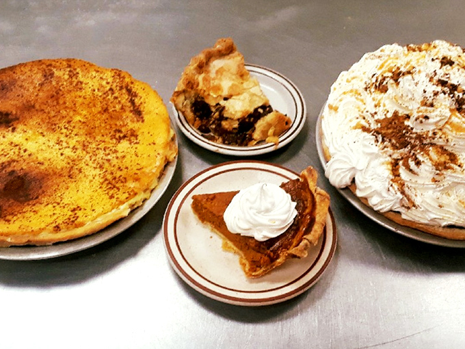 Pie paradise! That custard beauty, berry-filled masterpiece, and cream-topped wonder aren't just desserts—they're edible works of art worth every calorie.