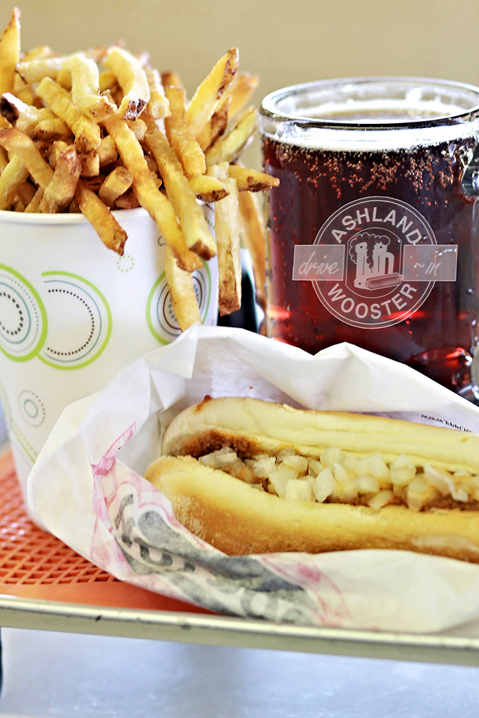 The holy trinity of Americana: golden fries, a proper hot dog, and that legendary root beer in a frosty mug that's worth the drive alone. Photo