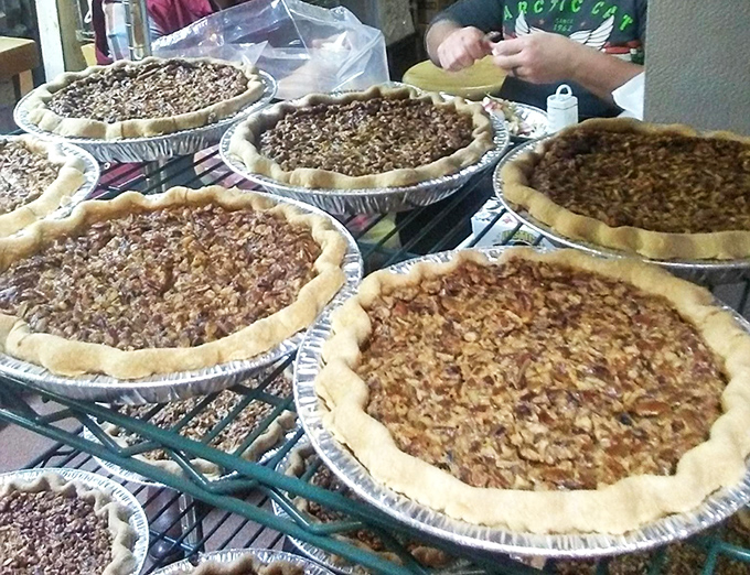 Behold the daily lineup of homemade perfection – each pie a masterpiece waiting for its moment of glory.