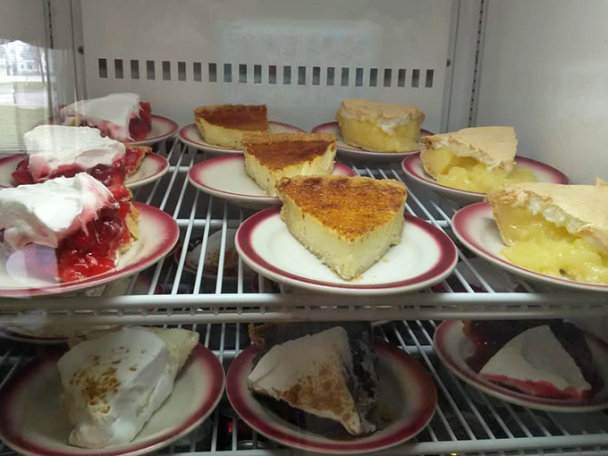 Pie heaven exists, and it's in this display case. Cherry, custard, and cream pies waiting patiently for their moment of glory on your plate.