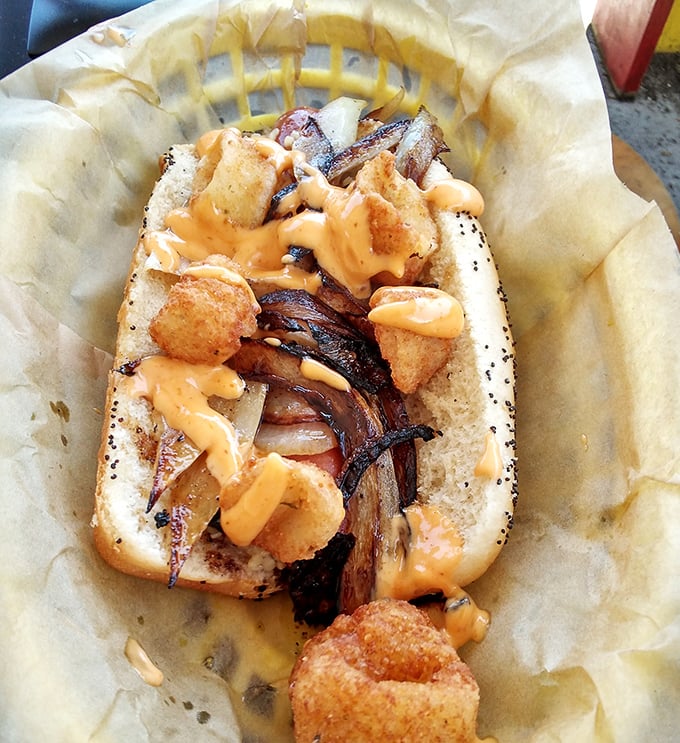 This isn't just a hot dog &ndash; it's a masterpiece of textures and flavors, where crispy toppings and melty cheese create perfect harmony.