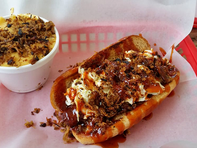This isn't just a hot dog&mdash;it's a masterpiece of beef, slaw, and those magical pork crispins that would make even the most dignified diner lick their fingers. 