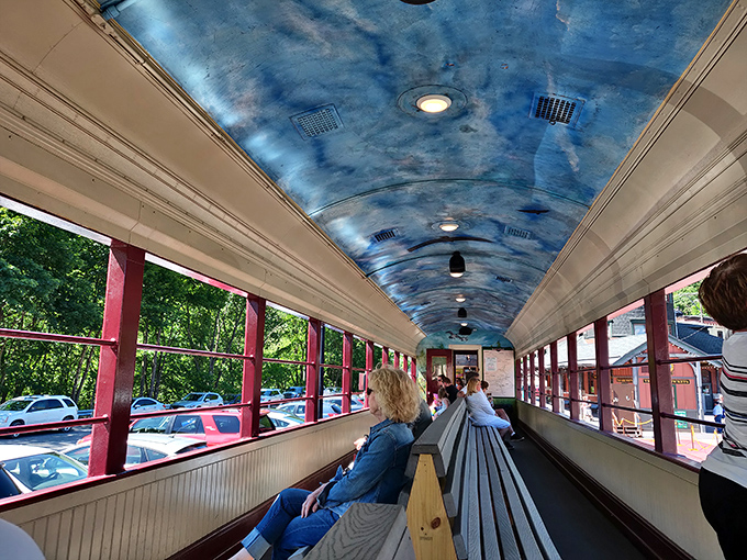 All aboard the nostalgia express! These wooden benches and sky-blue ceiling transform ordinary passengers into wide-eyed time travelers.